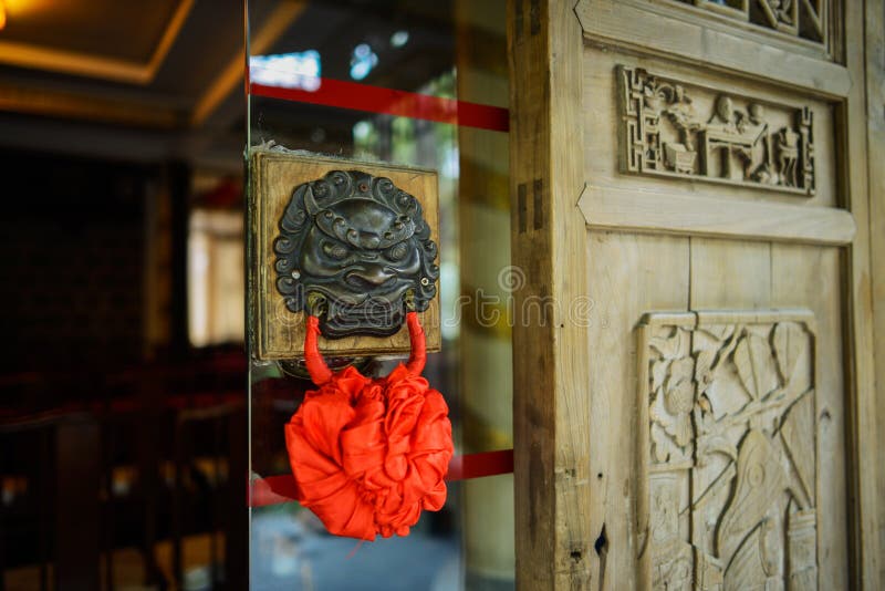 Brazen door knocker,China stock image. Image of lion - 39838261