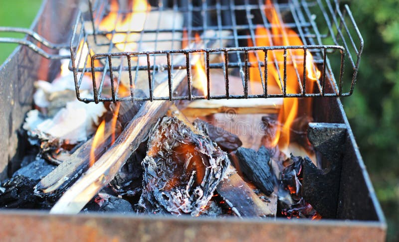 Brazier with fire stock image. Image of picnic, wood - 47703357