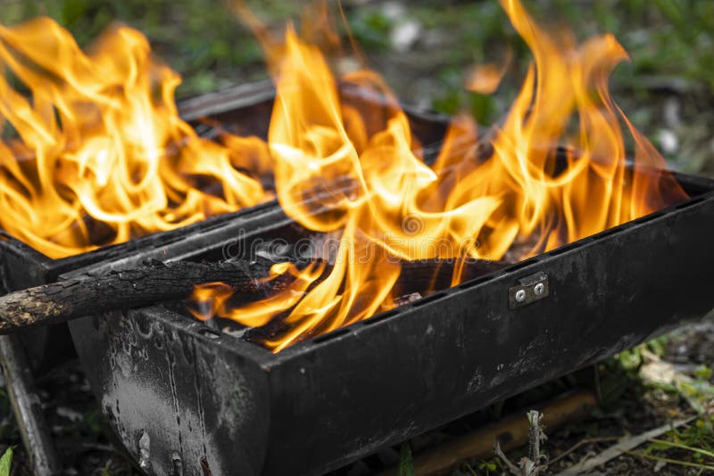 Brazier with Fire and Coals for Cooking on Fire in Nature. Background ...