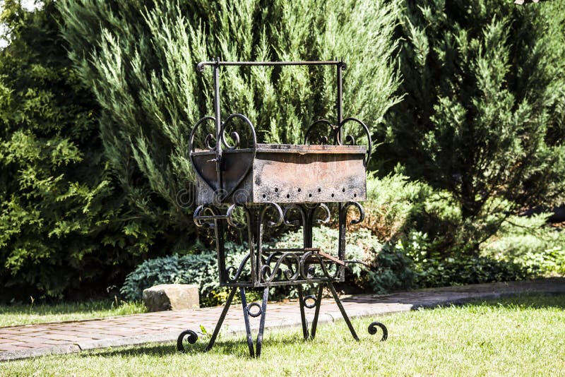 The Forged Brazier a Handmade Brazier with Shod Elements in a Yard ...