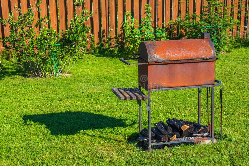 Brazier in garden stock photo. Image of combustion, mangal - 118297824