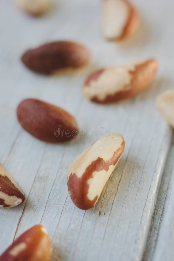Brazil Nuts Over the White Wooden Table. Stock Photo - Image of ...