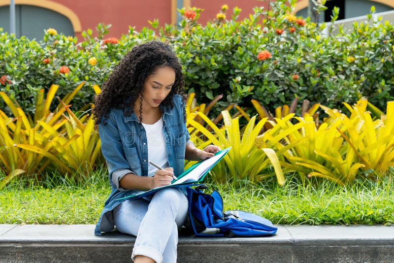 Brazilian Female Student Learning at Campus of University Stock Photo ...
