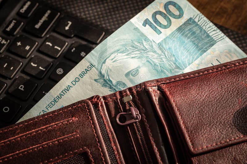 Brazilian Real, a Wallet Full of Money Lying on a Computer Keyboard ...