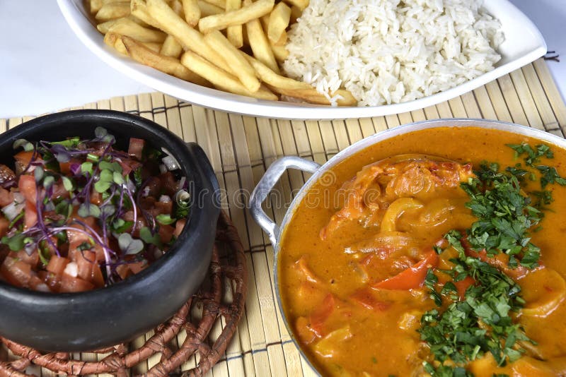 Brazilian Seafood Stew, Fish, Rice and Chips - Moqueca Stock Photo ...