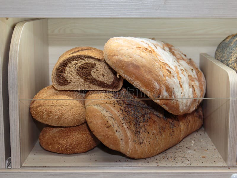 Bread Assortment Shown Inside White Compartment in Bakery Stock Image ...