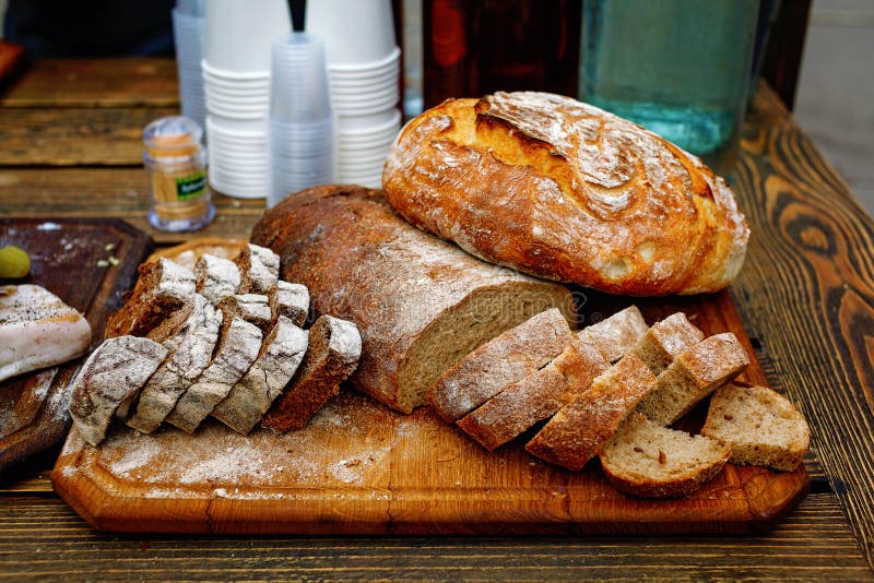 Bread Assortment on a Wooden Table Stock Image - Image of integral ...