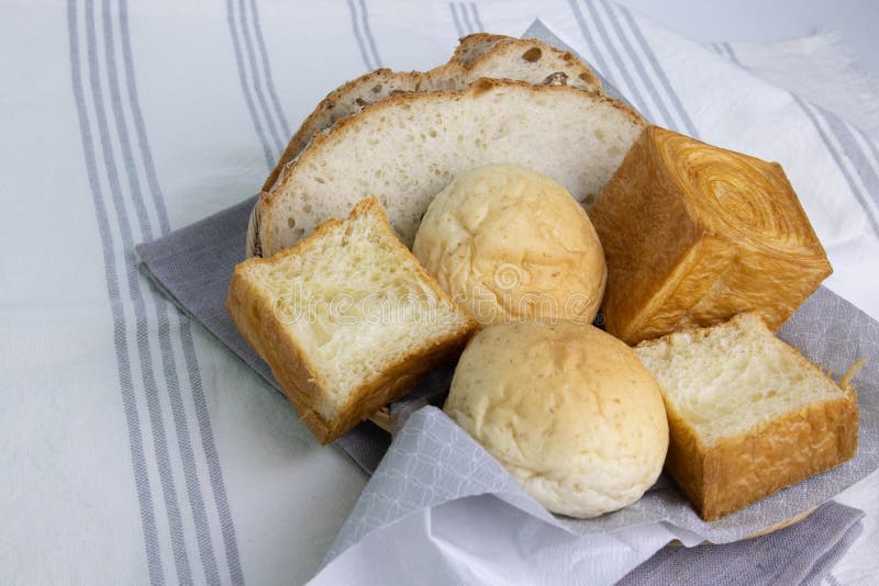Mixed Bread in a Basket on White Background Stock Photo - Image of ...