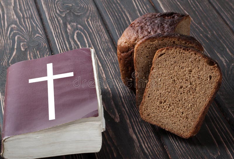 Bread and Bible close up stock photo. Image of flour - 105704692