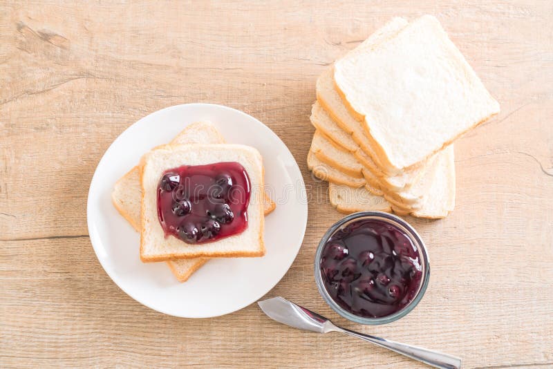 Bread with blueberry jam stock photo. Image of bread - 109164084