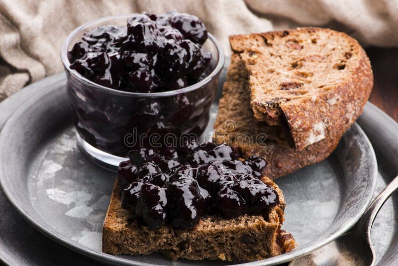 Bread with Blueberry Jam on the Plate Stock Photo - Image of food ...