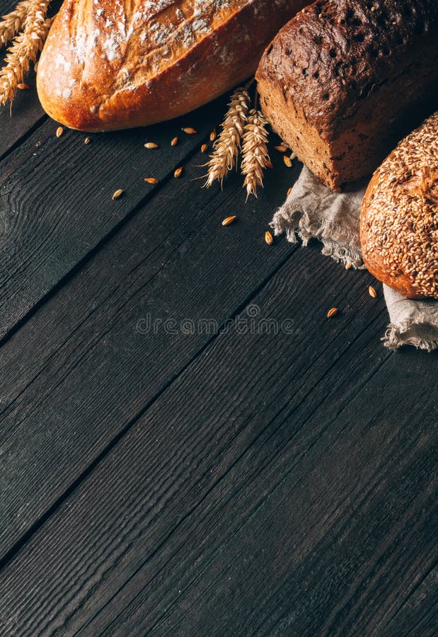 Bread Border on Dark Wood Background with Copy Space. Different Kinds ...