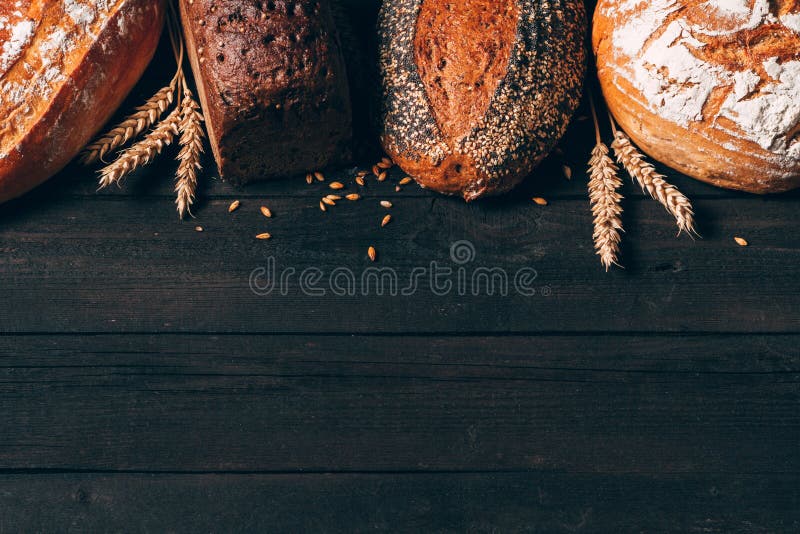 Bread Border on Dark Wood Background with Copy Space. Different Kinds ...