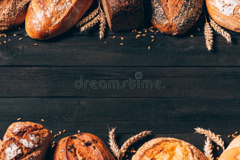 Bread Border on Wood Background with Copy Space. Different Types of ...