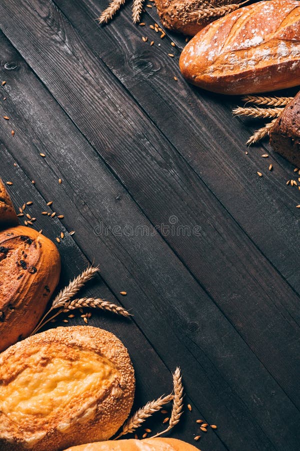 Bread Border on Wood Background with Copy Space. Vertical Composition ...