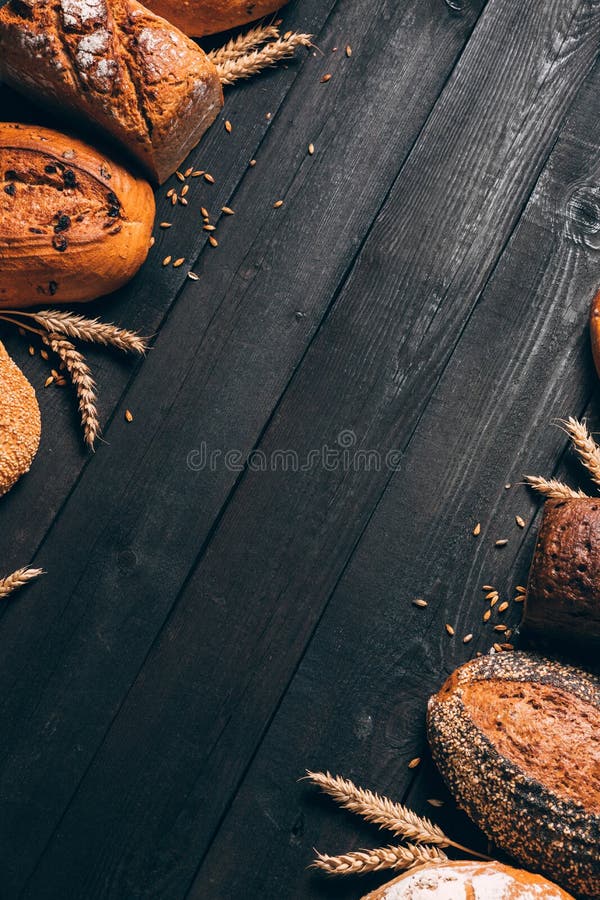 Bread Border on Wood Background with Copy Space. Vertical Composition ...