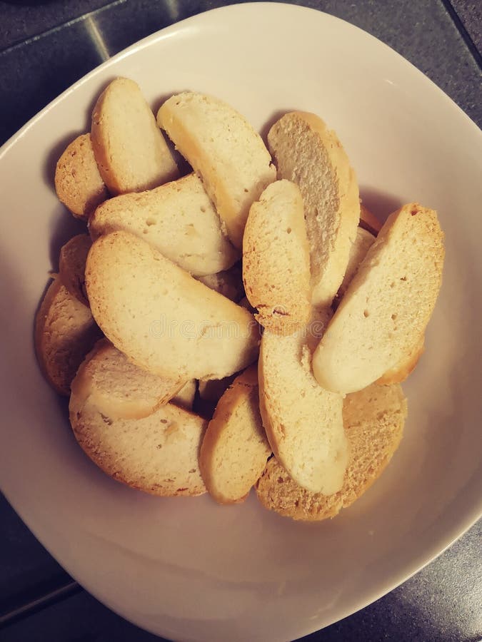 Bread on the plate stock photo. Image of baker, plate - 143576154