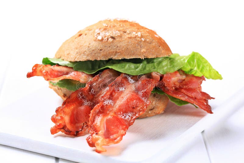 Bread Bun with Crispy Bacon Stock Photo - Image of food, breakfast ...