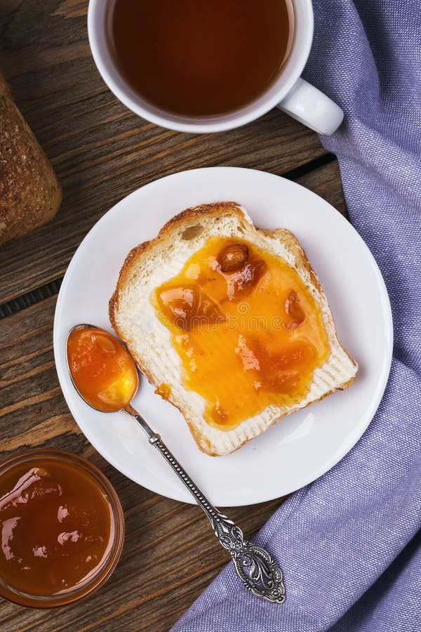 Bread with Butter, Apricot Jam and a Cup of Tea Stock Image - Image of ...