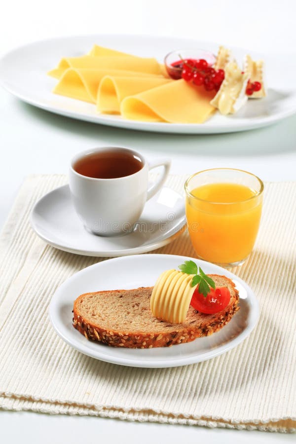 Bread with Butter, Cup of Tea and Orange Juice Stock Image - Image of ...