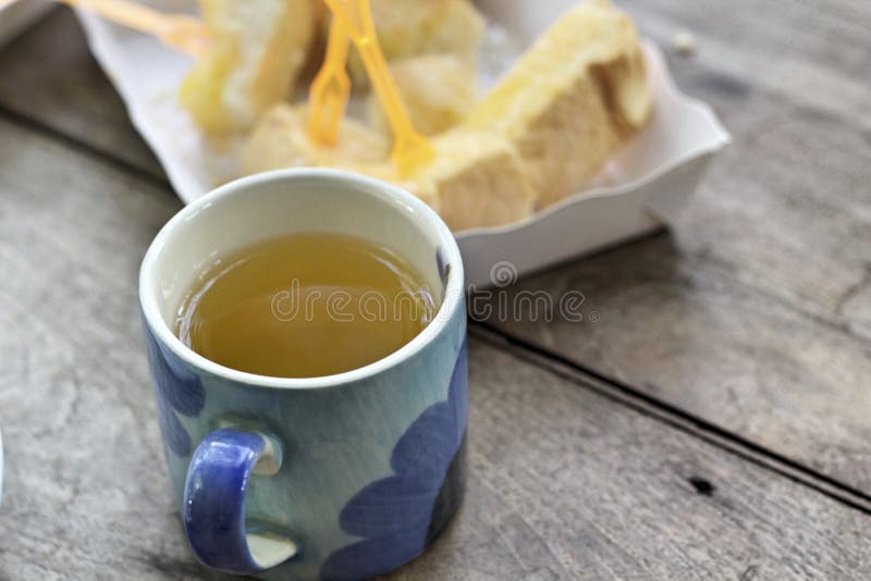 Bread, butter and hot tea stock image. Image of closeup - 47887193