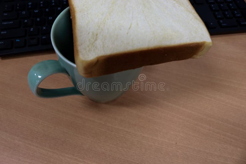 Bread and Coffee on the Table, for Breakfast at the Office Stock Photo ...