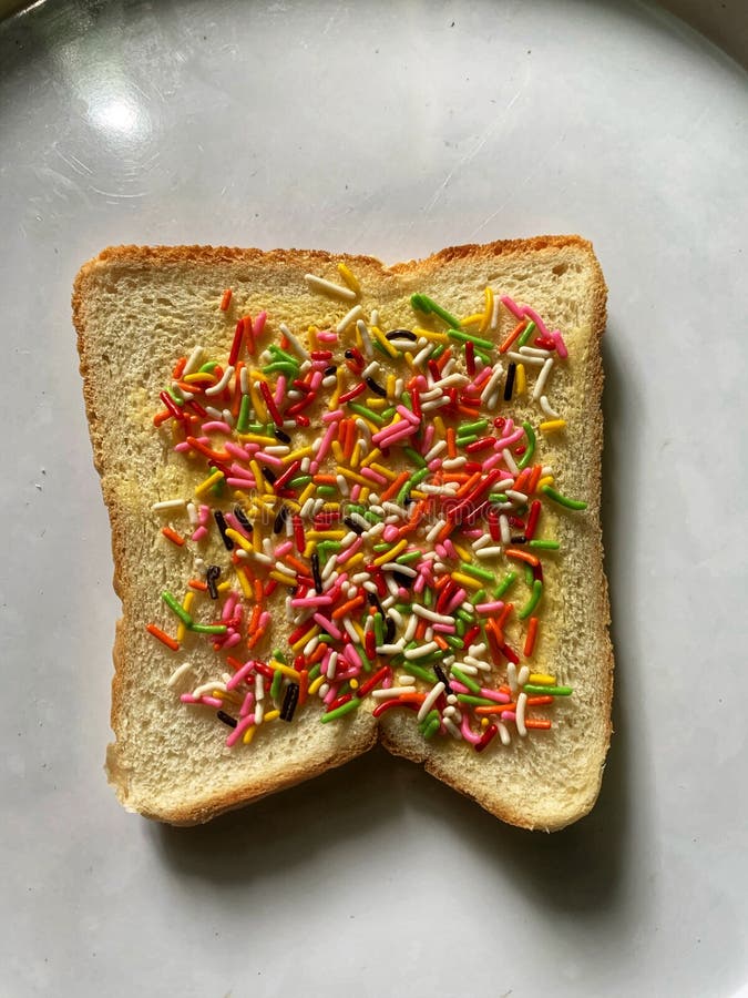 A bread stock photo. Image of colorful, sprinkles, breakfast - 209143968