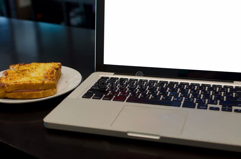 Bread and computer stock image. Image of office, table - 63632849