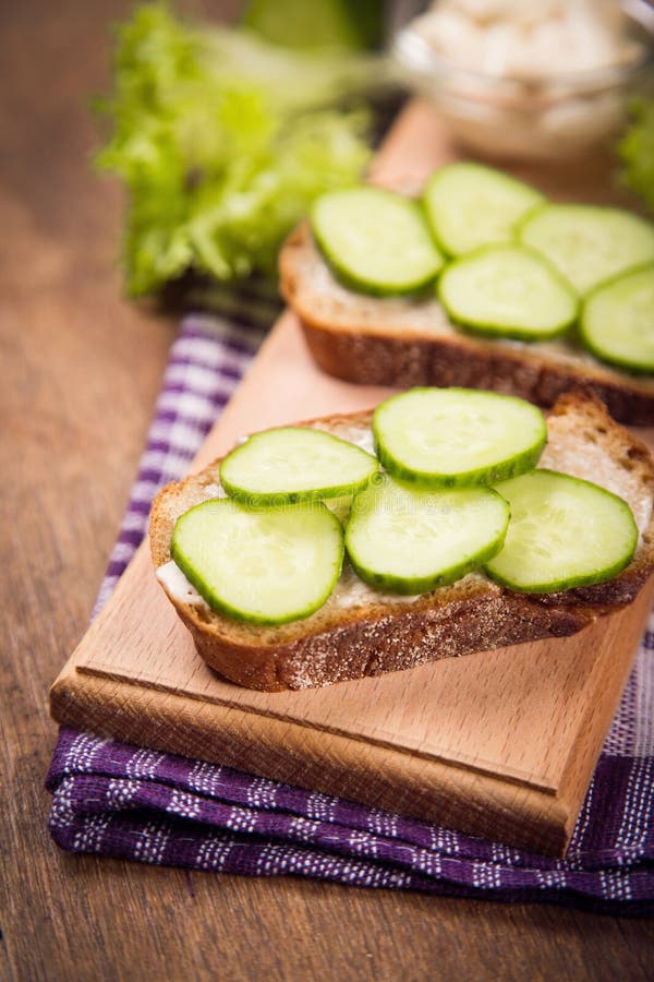 Bread with cucumber stock image. Image of board, cucumber - 63880147