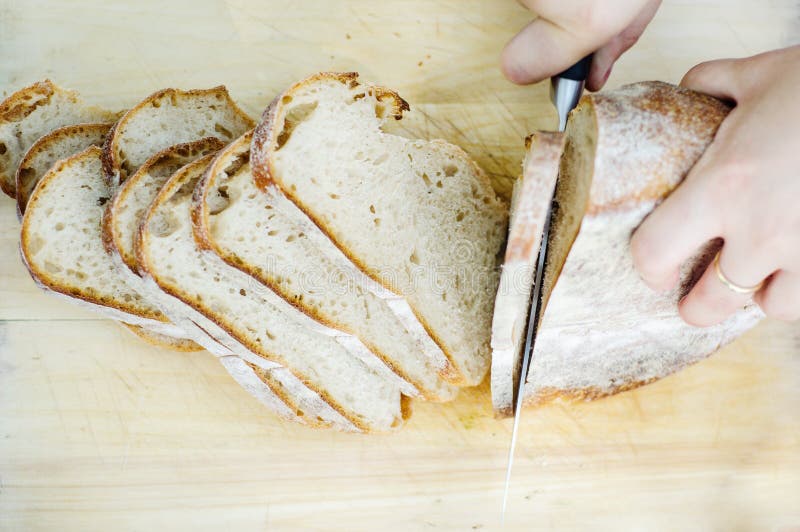 Bread cutting stock image. Image of knife, crust, board - 32725835