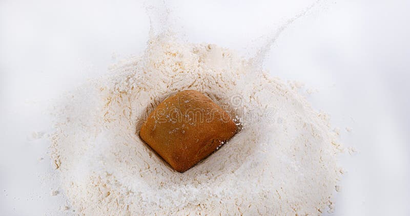 Bread Falling in Flour Against White Background Stock Image - Image of ...