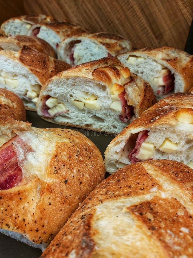 Bread Filled with Meat and Cheese, a Baking Sheet Full Stock Photo ...