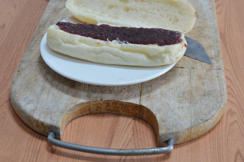 Bread Filling Red Bean Jam and Knife Stock Image - Image of bean, dish ...