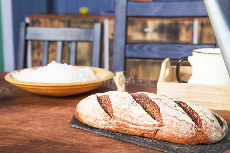 Bread and Flour on a Wooden Table Stock Image - Image of farm, bakery ...