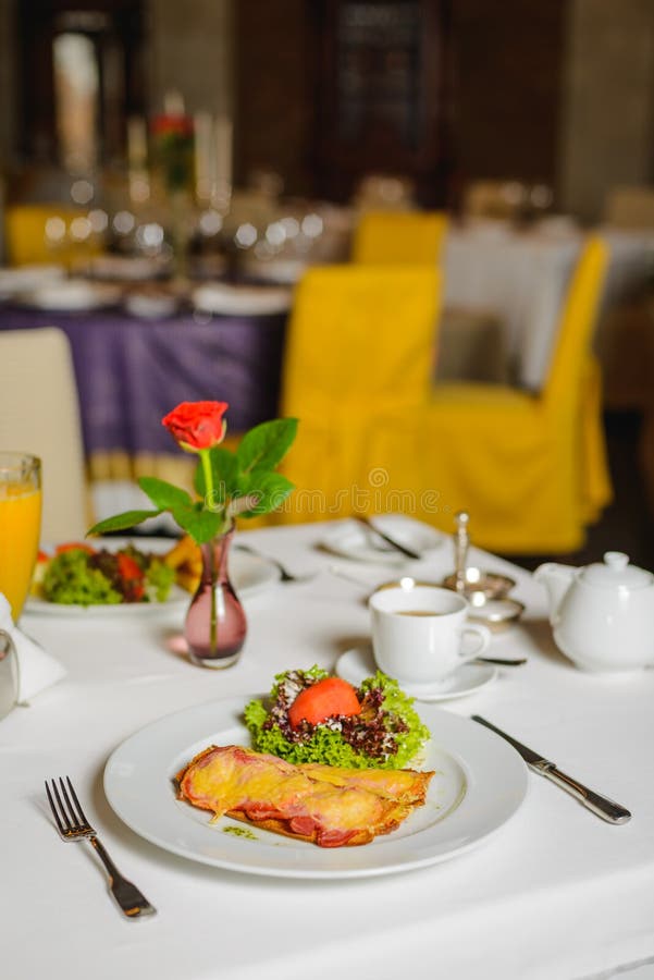 Bread with Fried Bacon and Cheese. Breakfast in Empty Restaurant Stock ...