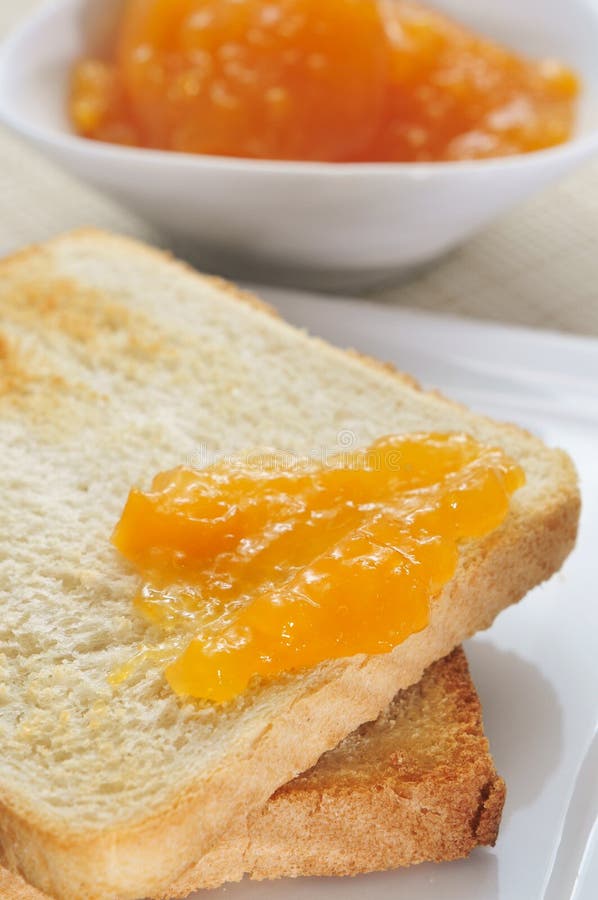 Delicious Apricot Jam on a Slice of Bread with Butter Stock Image ...
