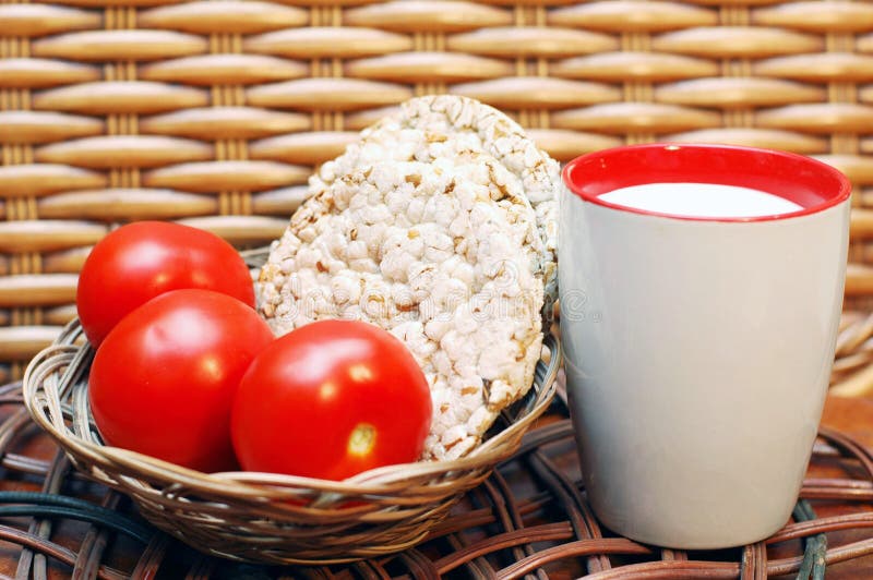 Bread, milk and tomatoes stock photo. Image of brown - 25378330