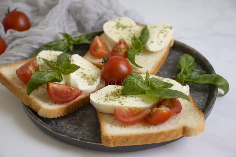 Bread with Mozzarella Cheese, Organic Tomato on a Light Background ...