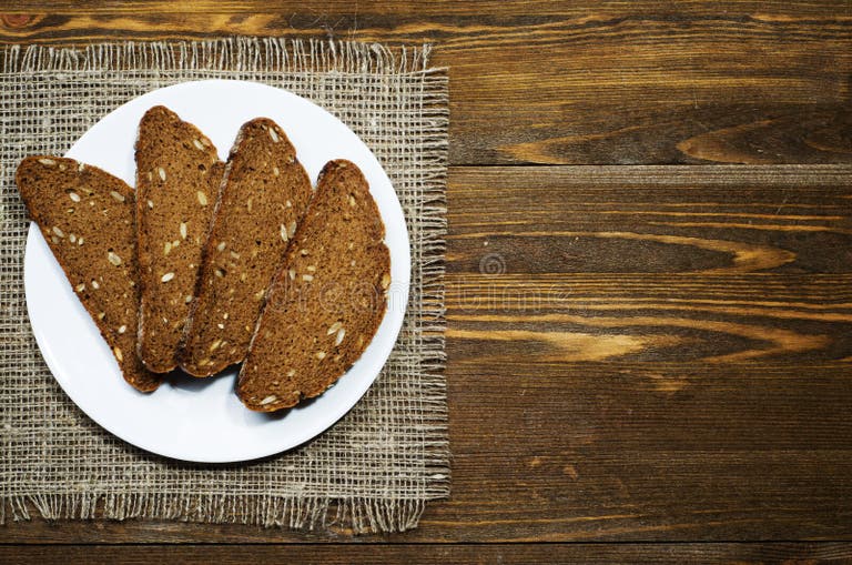 Bread Placed on a Wooden Slope in the Background Stock Photo - Image of ...