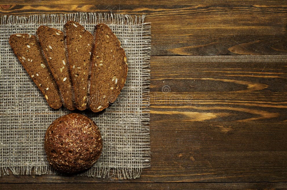 Bread Placed on a Wooden Slope in the Background Stock Image - Image of ...