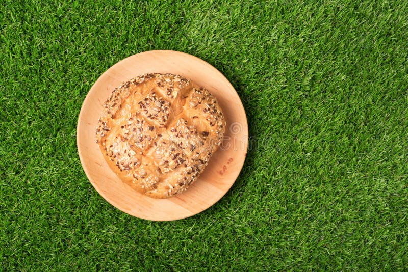 Bread on the Plate on the Green Grass Stock Photo - Image of closeup ...