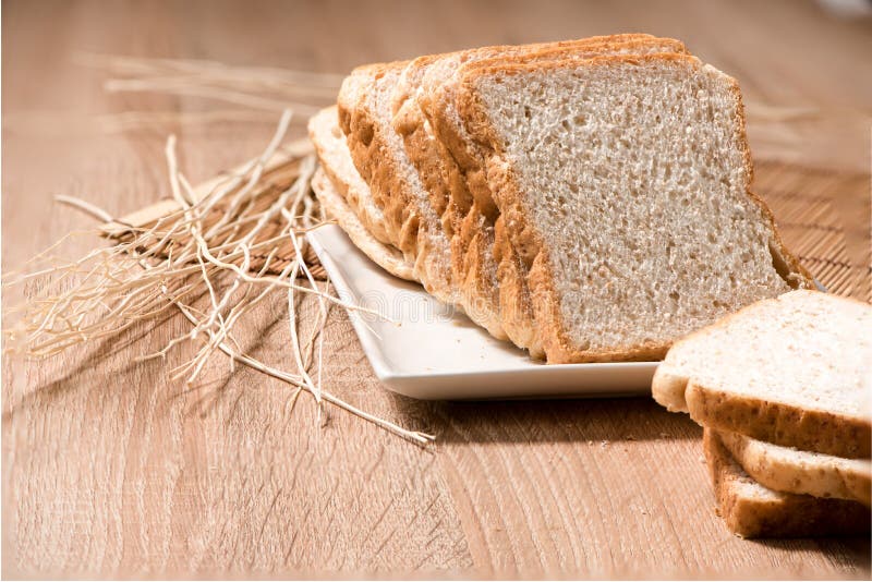 Bread in Plate on Wood Table Stock Image - Image of brown, wood: 65609733