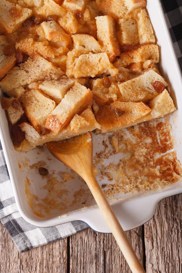 Bread Pudding with Raisins Close Up in Baking Dish. Vertical Top Stock ...