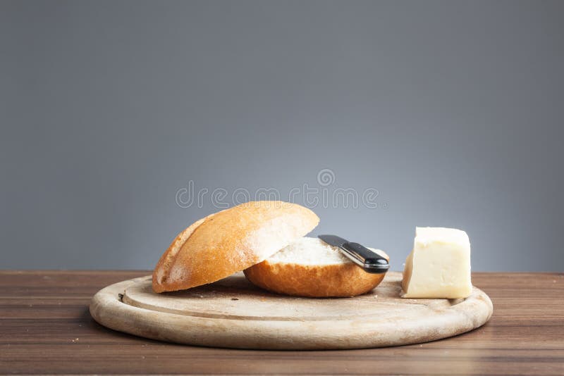 Bread Roll, Knive, Butter, on Plate Stock Image - Image of bread, roll ...