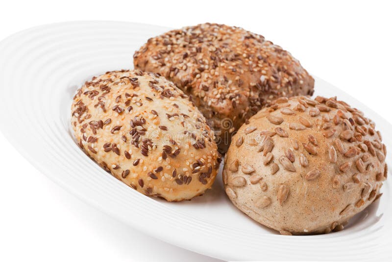 Bread rolls on plate stock photo. Image of roll, bakery - 12545964