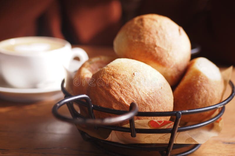 Bread Rolls Rest in a Black Bowl on the Table Stock Image - Image of ...