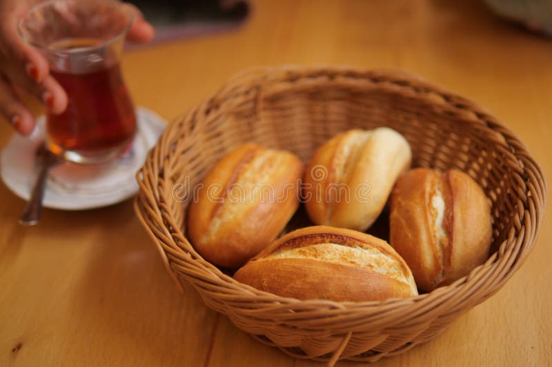 Bread Rolls Rest in a Black Bowl on the Table Stock Image - Image of ...
