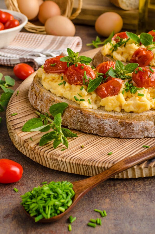 Bread scrambledd eggs stock image. Image of rustic, breakfast - 99268433