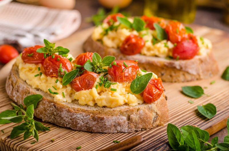 Bread scrambledd eggs stock image. Image of morning, dinner - 99566617