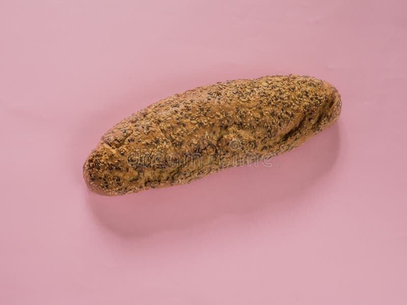 Bread with seeds on pink stock image. Image of grain - 137937185